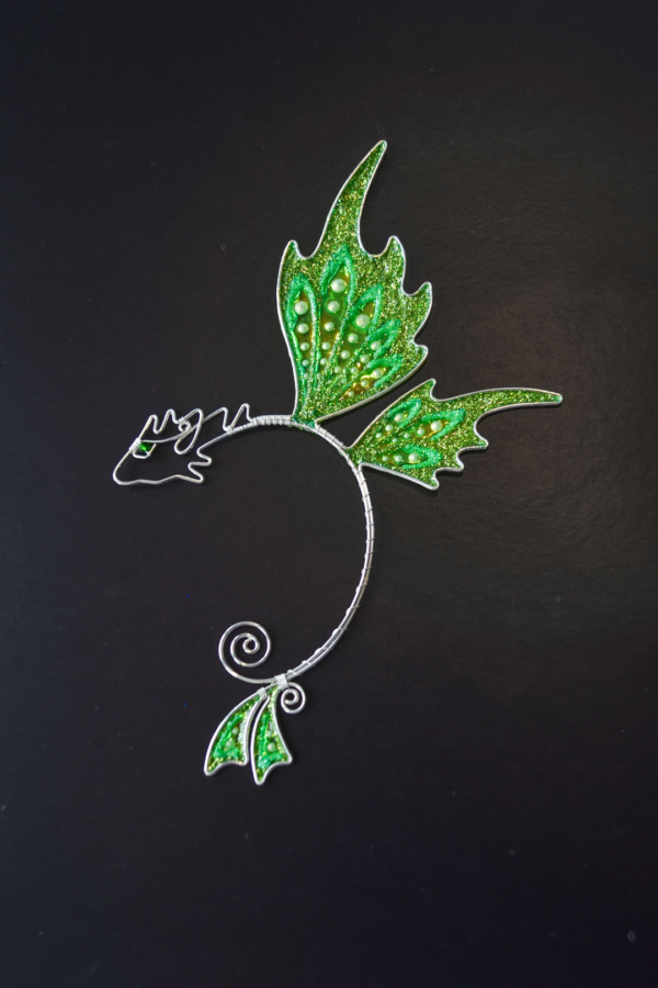 Crafted with care, this Fairy dragon ear cuff green brings timeless ...